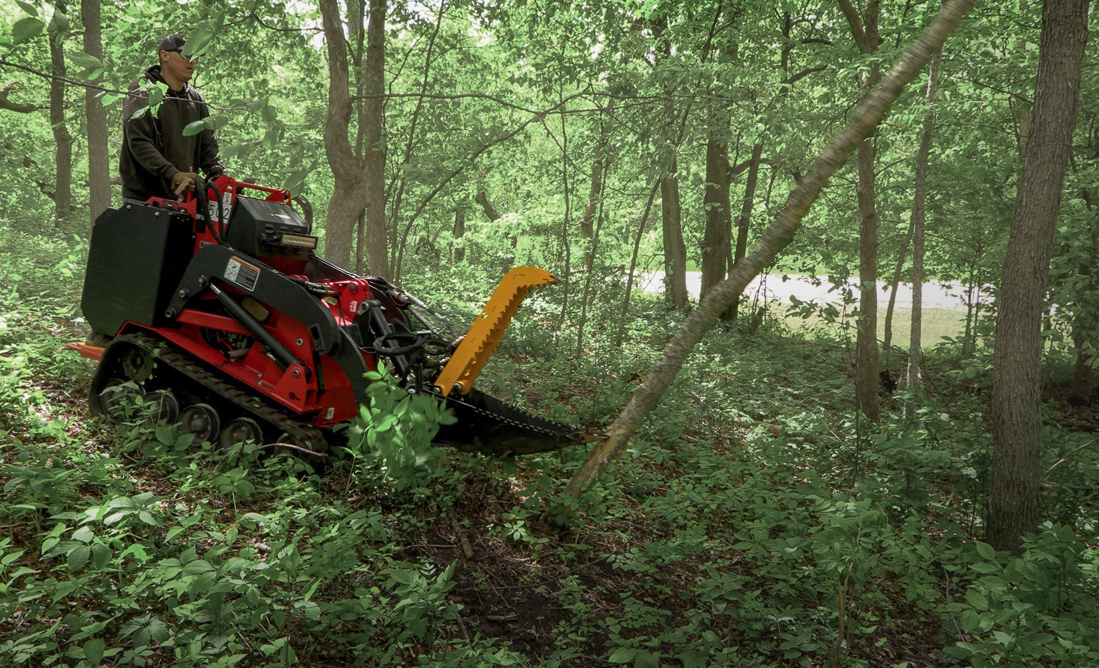 Mini Skid Steer | Application | Forestry – Quick Attach